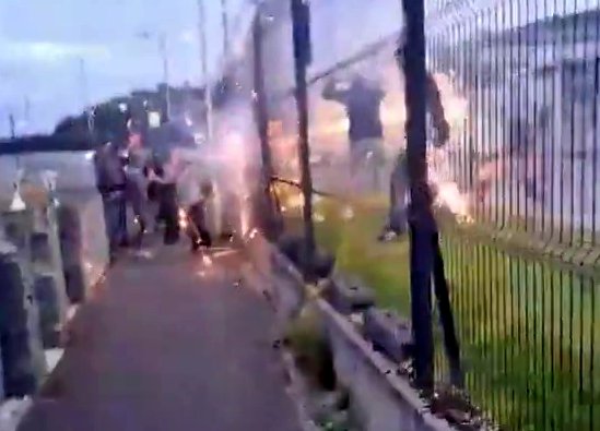 Masked hooligans clash in violent football fight