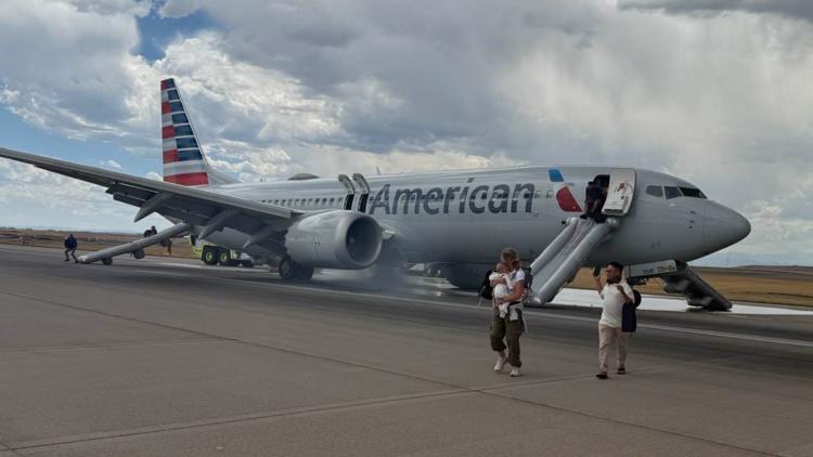 Passengers evacuated from plane at Denver airport