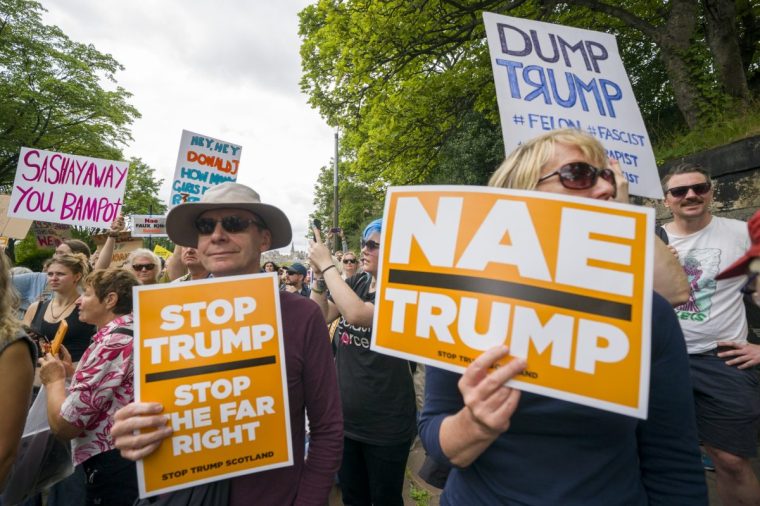 Protests in Scotland as Trump begins five-day visit with game of golf