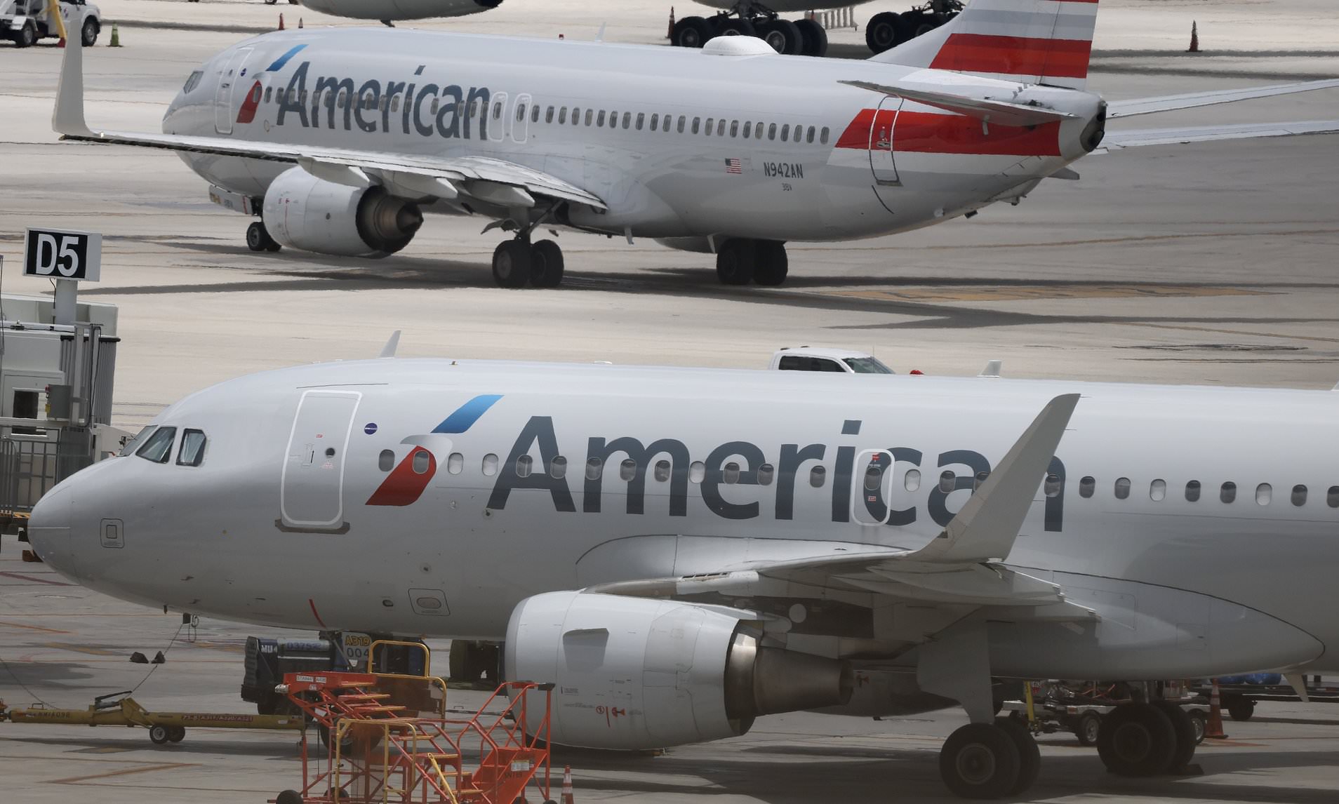 American Airlines flight is evacuated on runway as landing gear falters