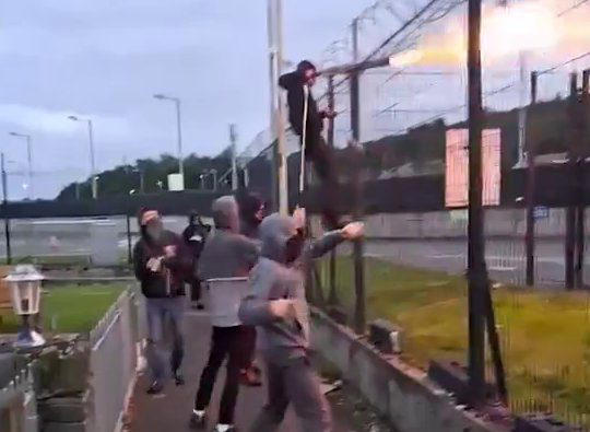 Masked hooligans clash in violent football fight