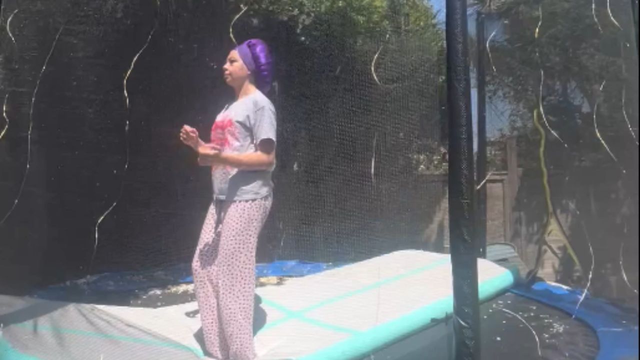 Girl lands impressive backflip but slips right through unzipped ...