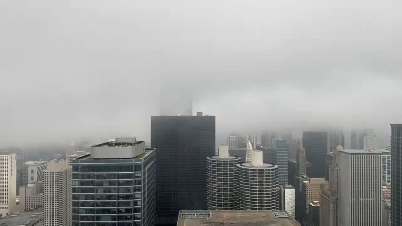 Dense mist blankets city skyline in Chicago, Illinois, USA