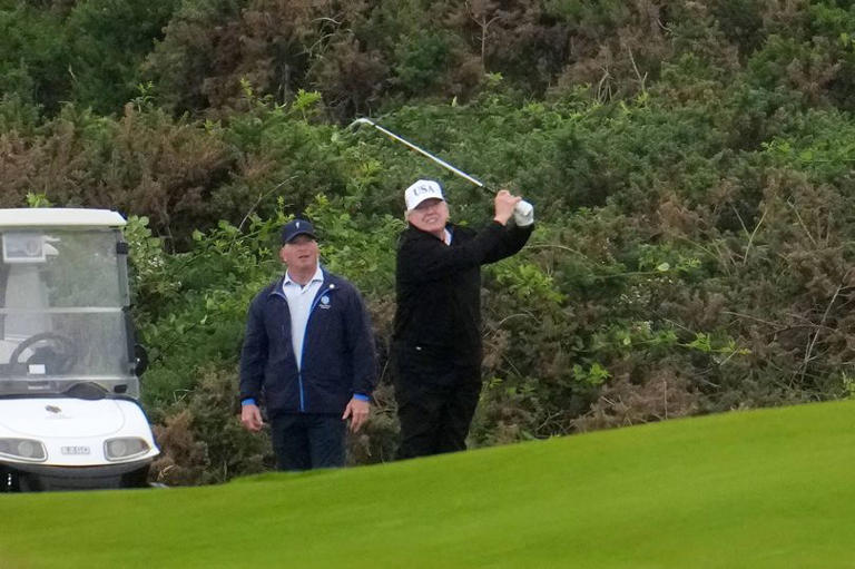 Donald Trump sparks golf cheat claims as his caddie seen dropping a ball