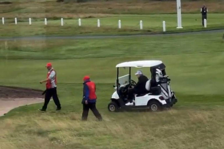 Donald Trump sparks golf cheat claims as his caddie seen dropping a ball