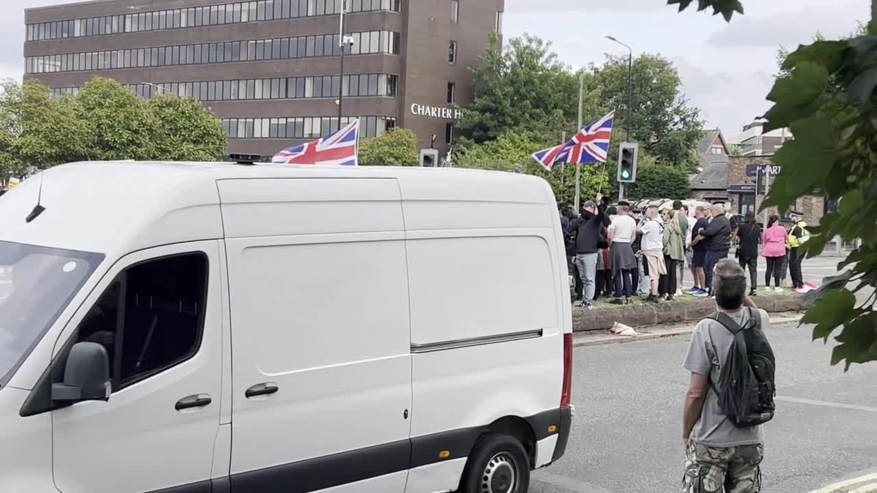 Hundreds gather in protest outside Altrincham hotel housing migrants