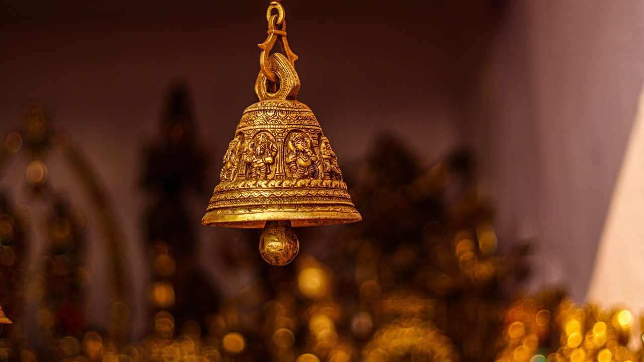 Ringing the temple bell before entering; history and significance
