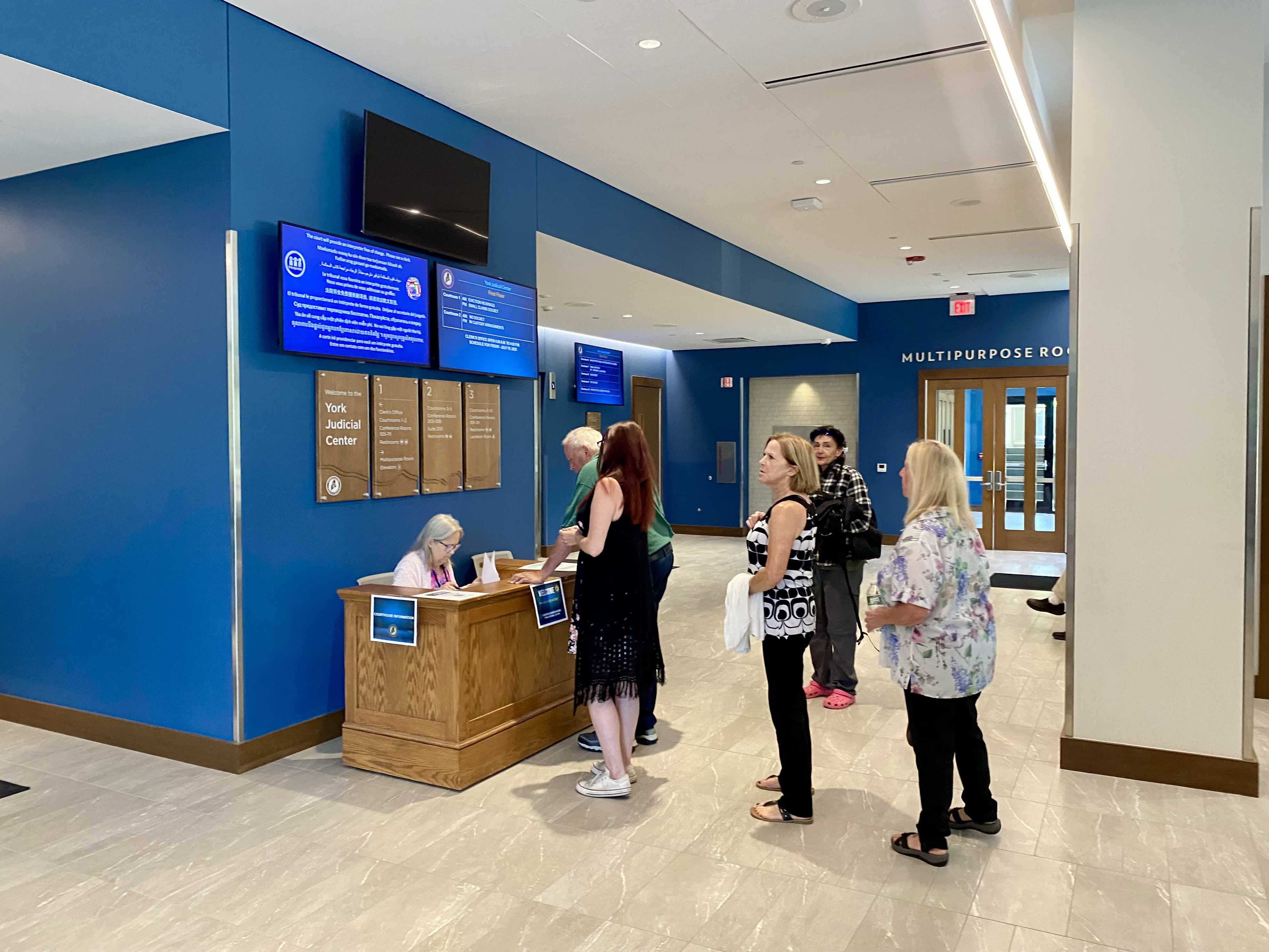 Volunteer greeters bringing joy to Maine's court system