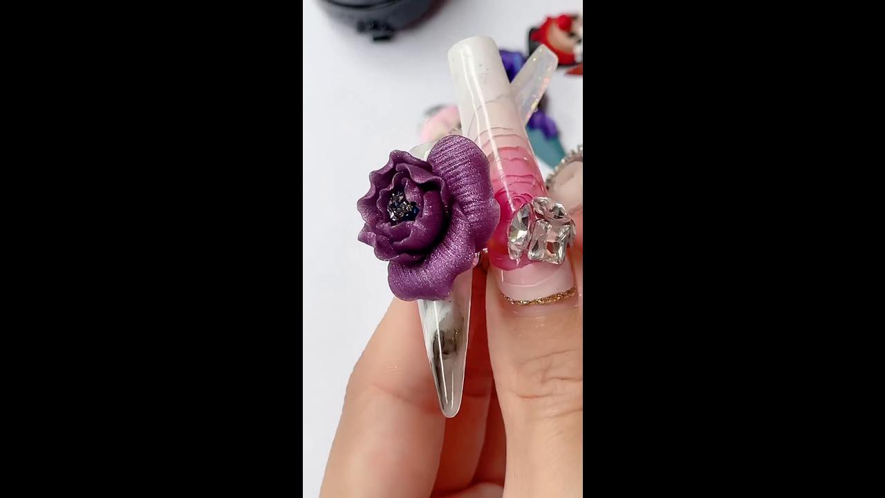 3D Purple Flower With Glamour Diamonds Nail Art
