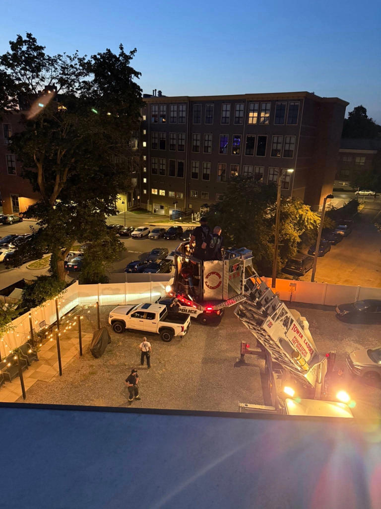 Elderly Woman With Dementia Rescued From Roof Of 4-Story Apartment ...