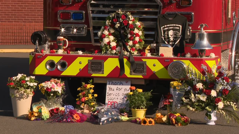 Growing number of flowers adorn Plainville fire truck in honor of ...