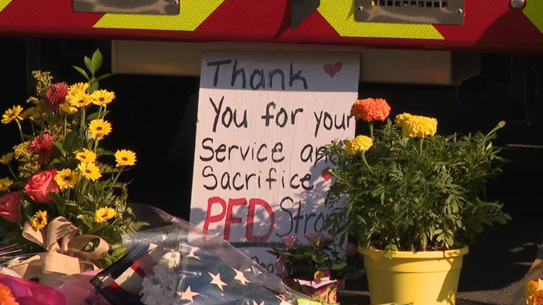 Growing number of flowers adorn Plainville fire truck in honor of ...