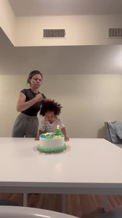 Kid's Hair Catches Fire from Candle