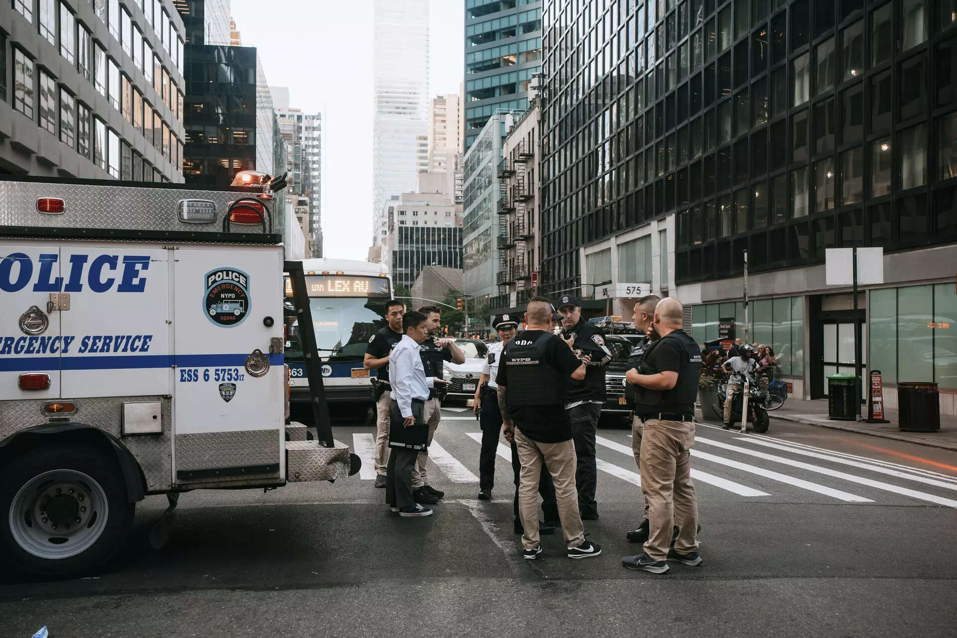 NYPD officer and civilian wounded, suspect dead as gunfire erupts in ...