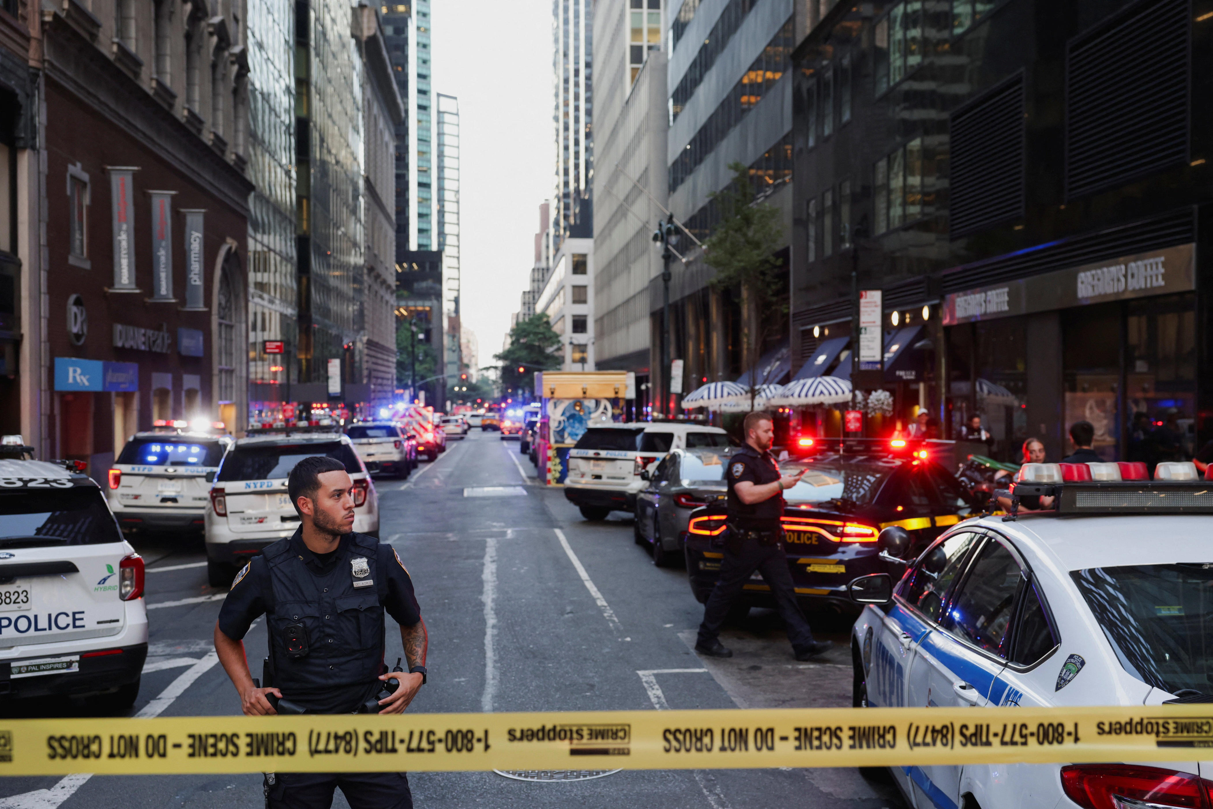 Gunman kills four, injures five in rush-hour attack at Manhattan skyscraper