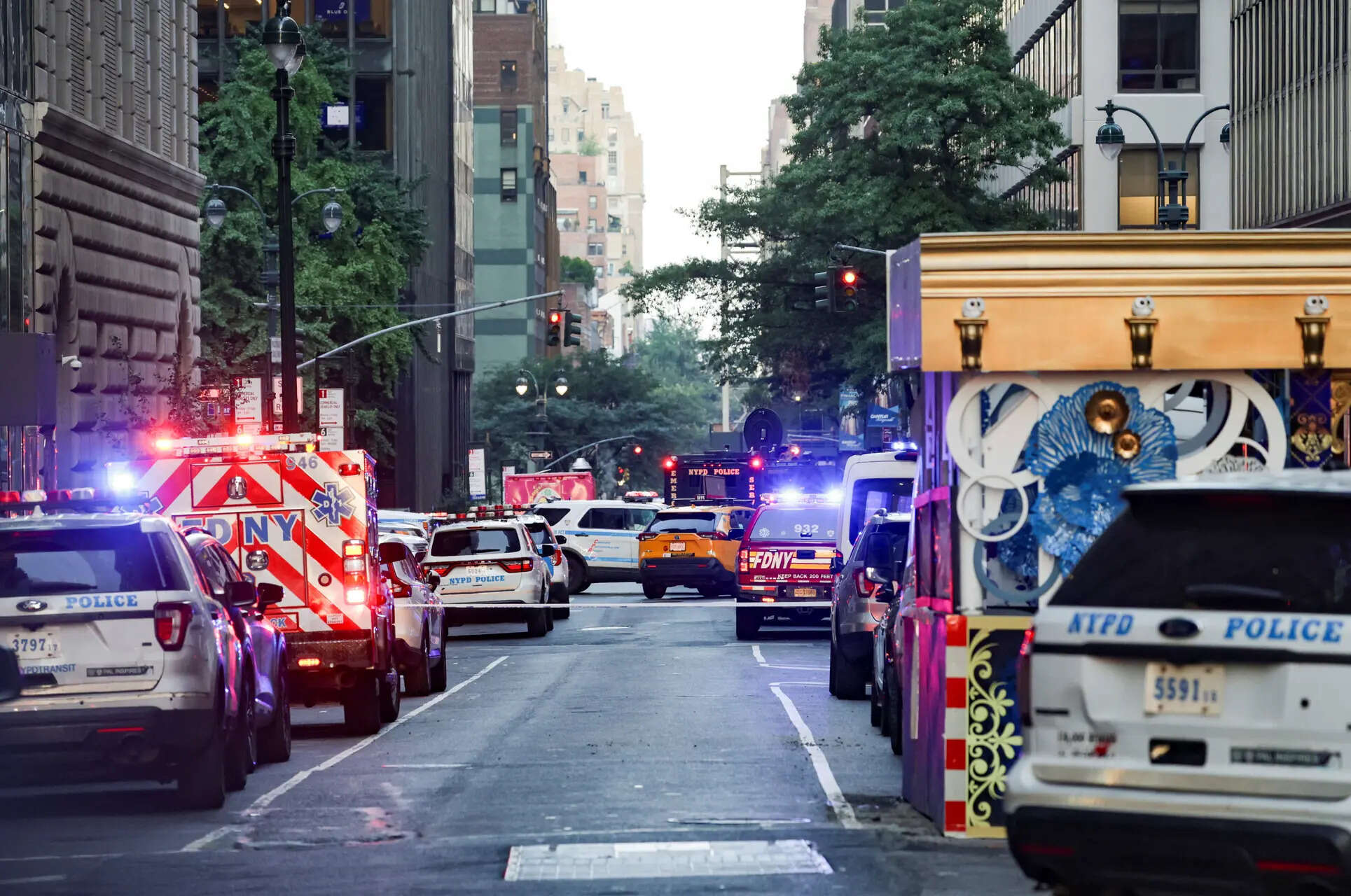 Active shooter dead in Midtown Manhattan; NYPD officer, two civilians ...