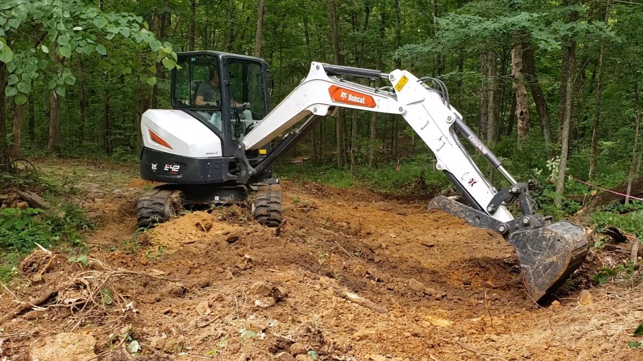 Fixing & Rerouting a Water Erosion Ditch — Bobcat E42 Mini Excavator