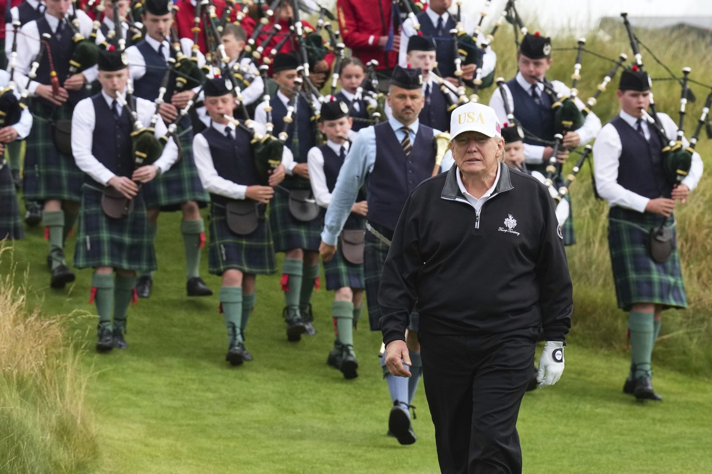 Trump caps his Scottish visit by opening a new golf course and ...