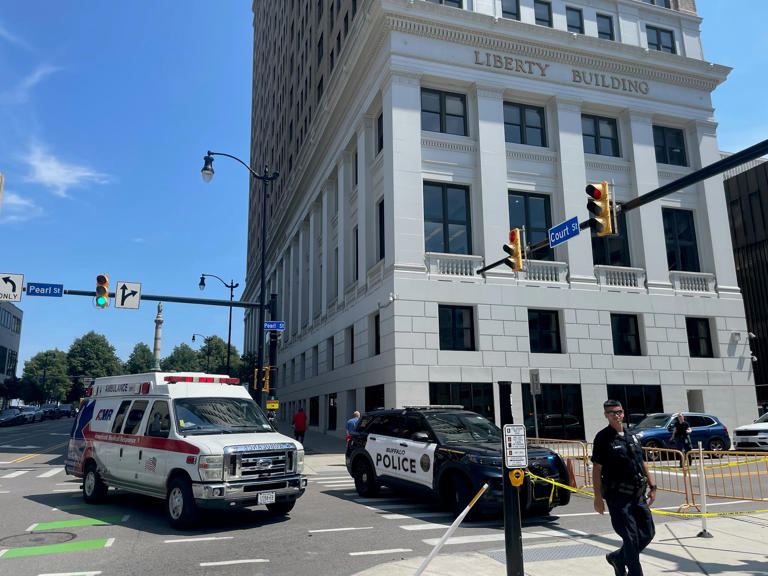 Pedestrian hurt after debris falls from Liberty building in Downtown ...