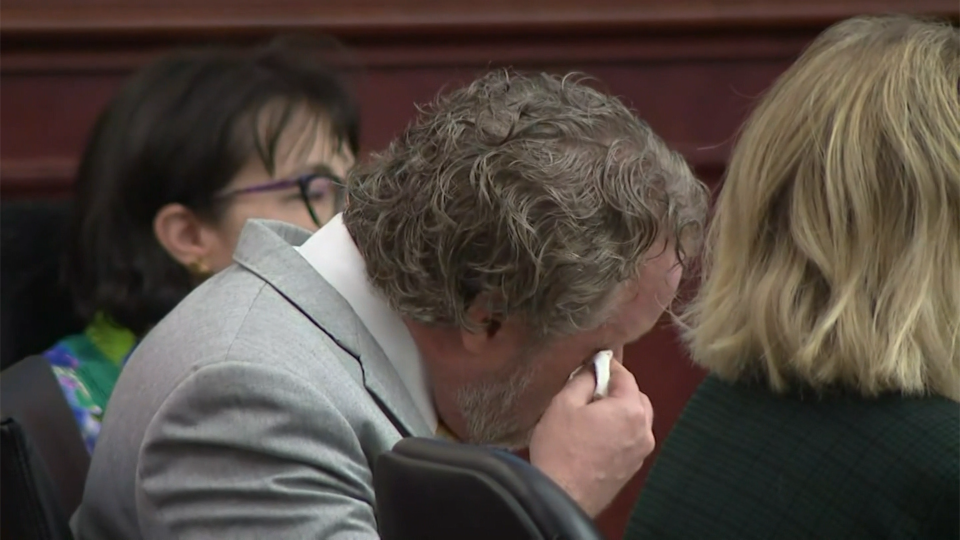 James Craig wipes tears during closing arguments in murder trial