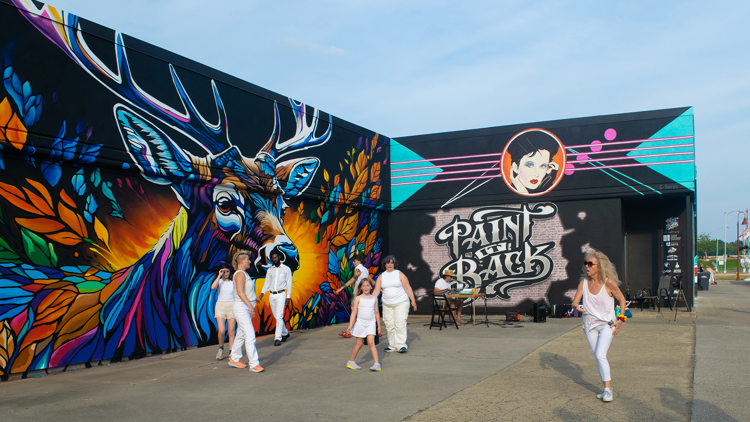 Paint it Back festival returns to Clinton with live murals and street art