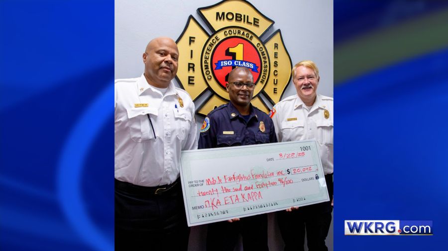 Mobile firefighters receive donation from USA fraternity