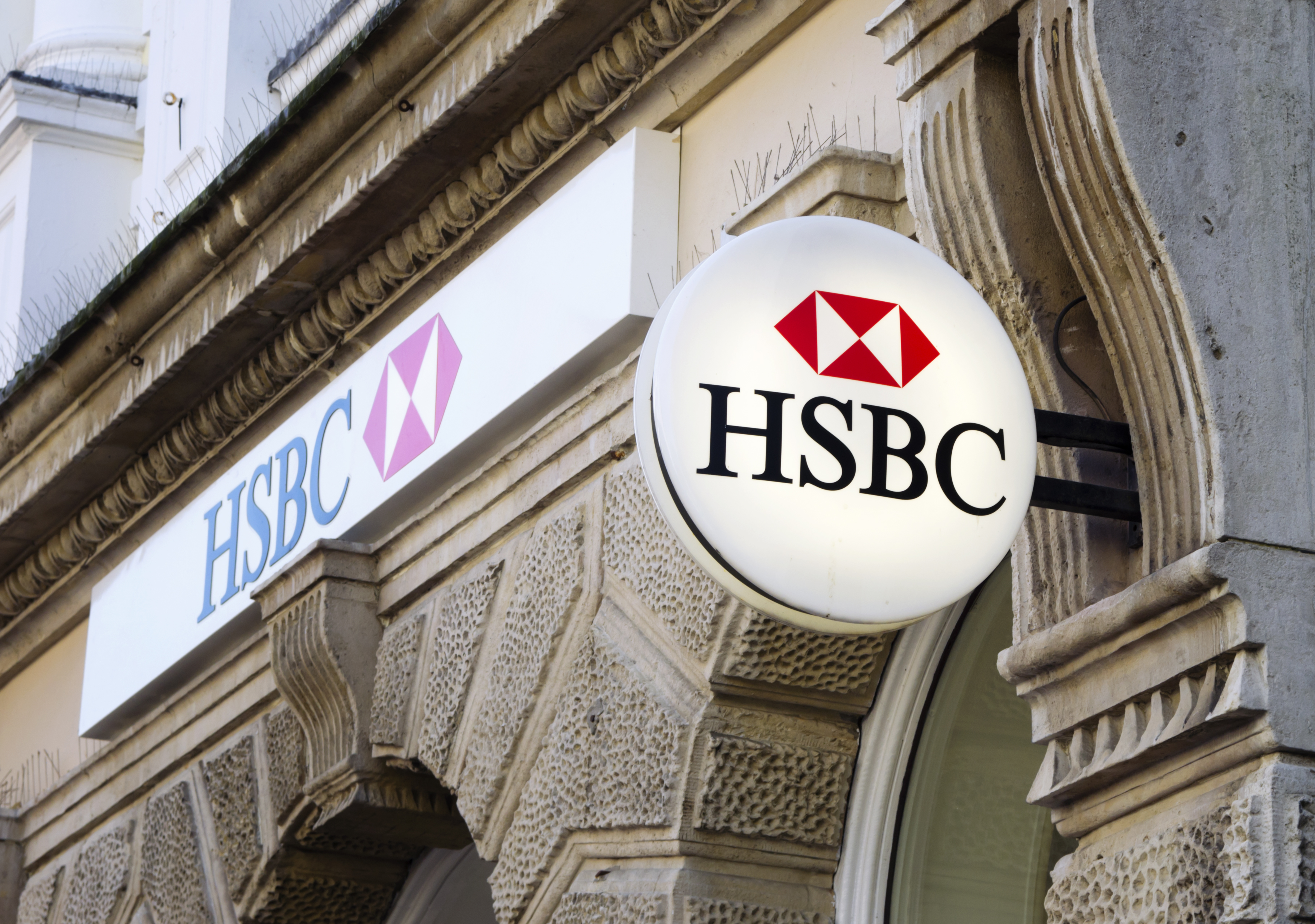 HSBC launches $3bn share buyback despite second-quarter profit plunge