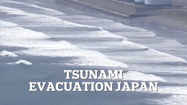 Large waves slam Hokkaido as Japan orders tsunami evacuations