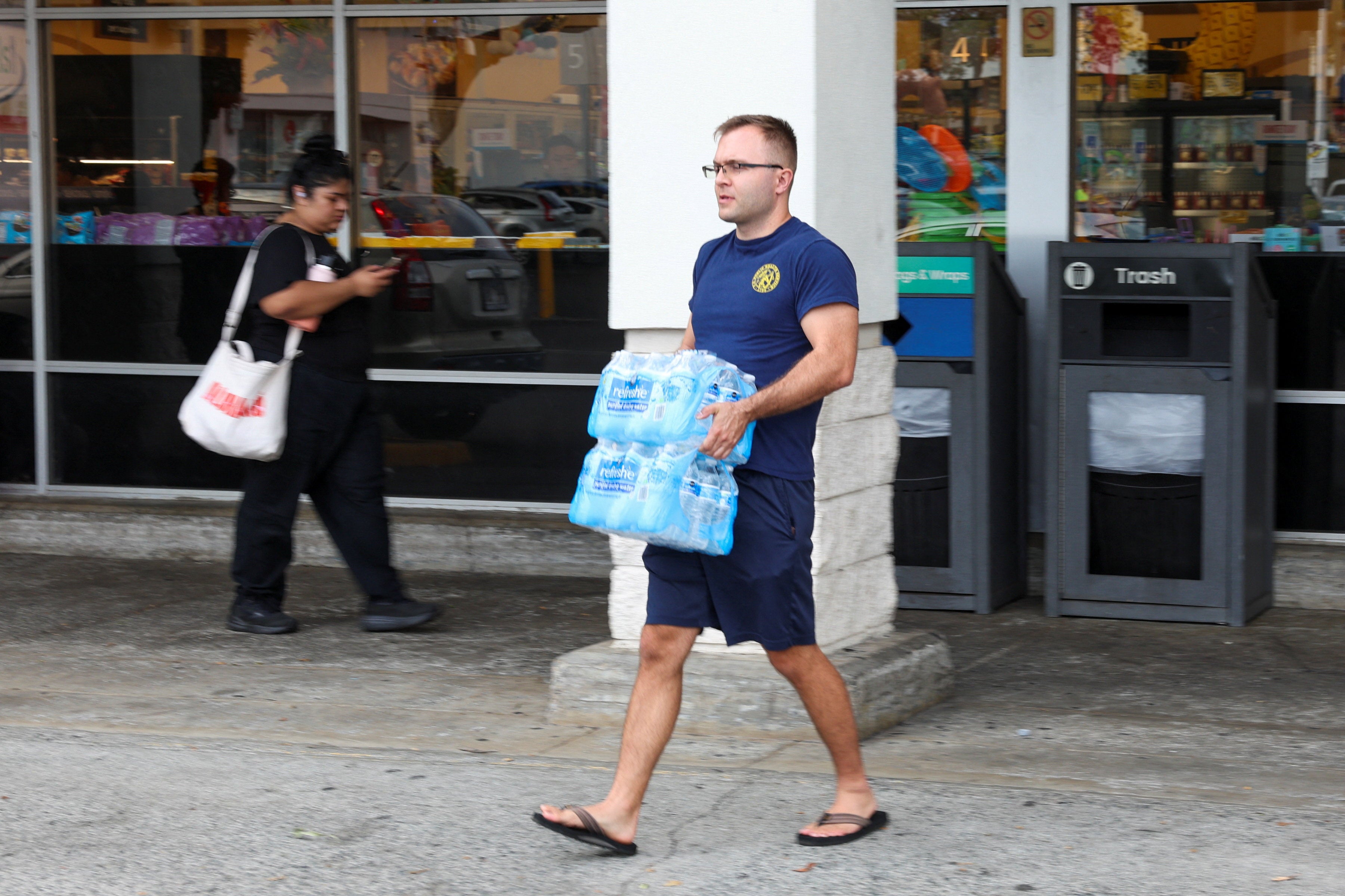 In pictures: People run for cover and beaches empty out as Russia quake ...