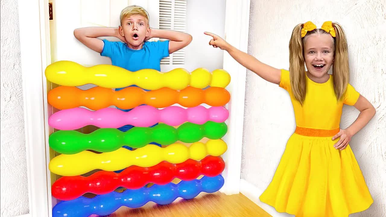 Slava and Artem play with balloons together