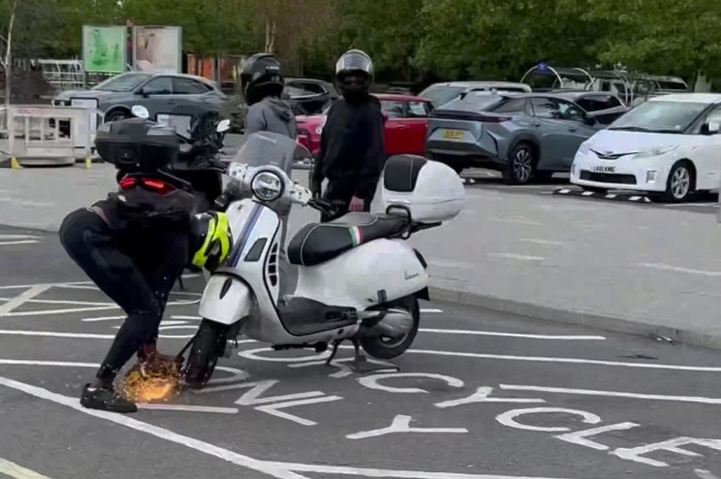 Video shows brazen thieves stealing moped outside IKEA with angle grinder