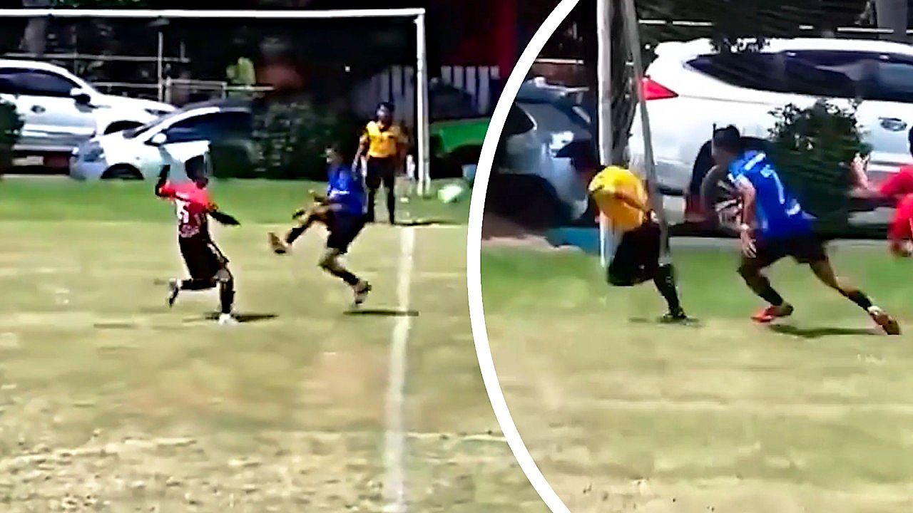 Soccer player freaks out and attacks referee after getting red card