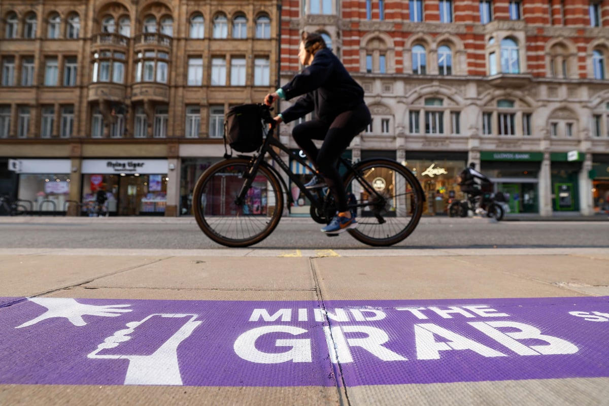 Purple pavement markings part of Mind the Grab campaign to tackle phone ...