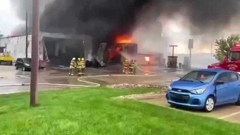 Video shows crews battling flames, billowing black smoke after flash ...