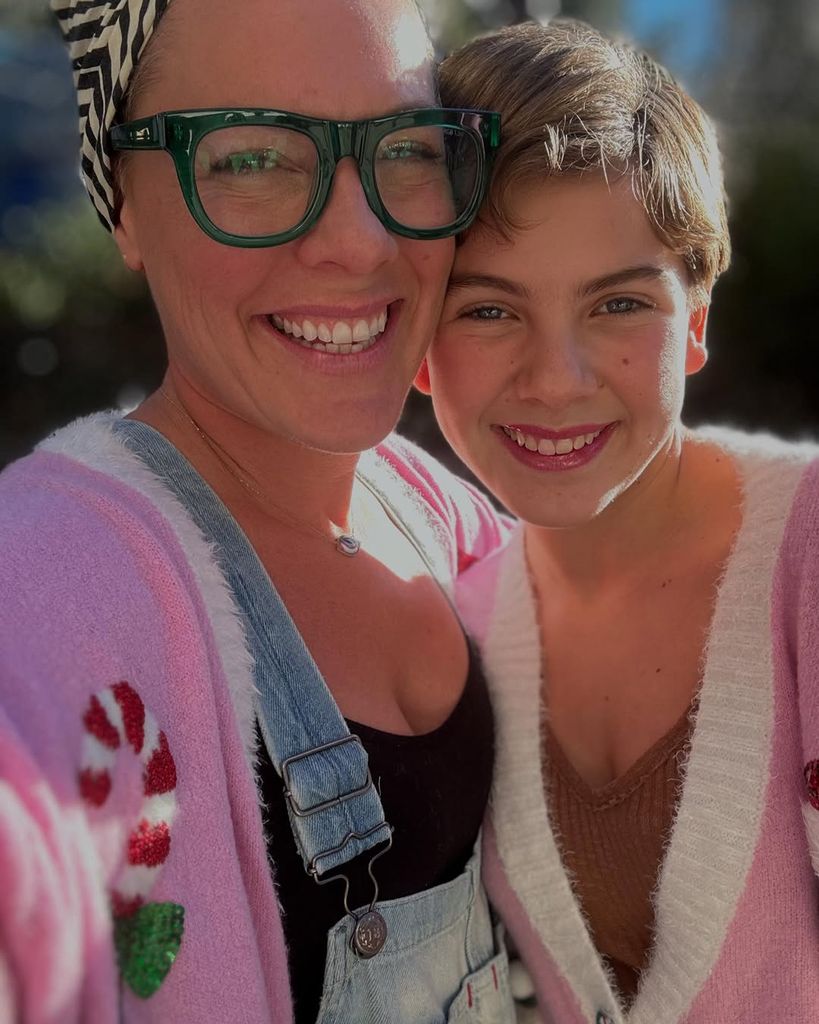 Pink's teen blonde daughter is as tall as the singer is in new family photo