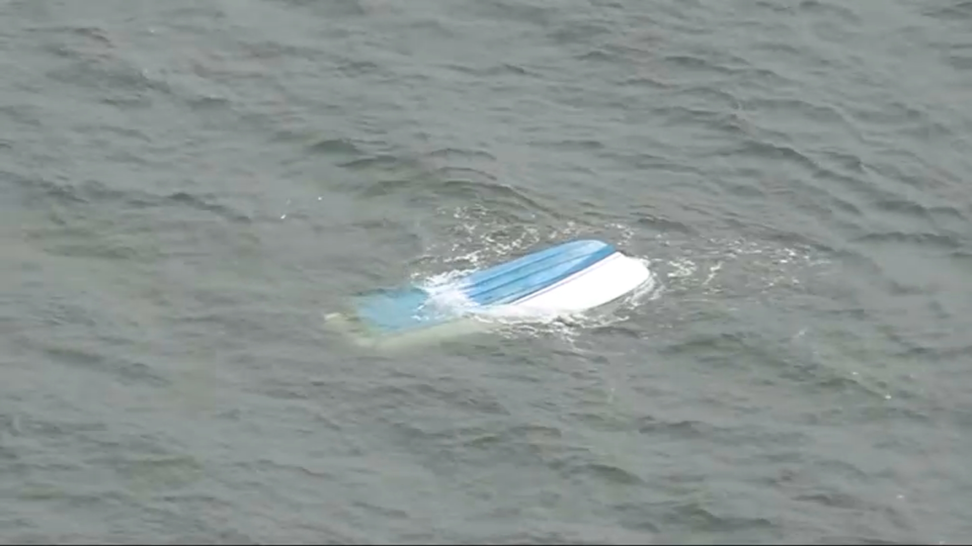 Crews respond to overturned boat off coast of Beverly