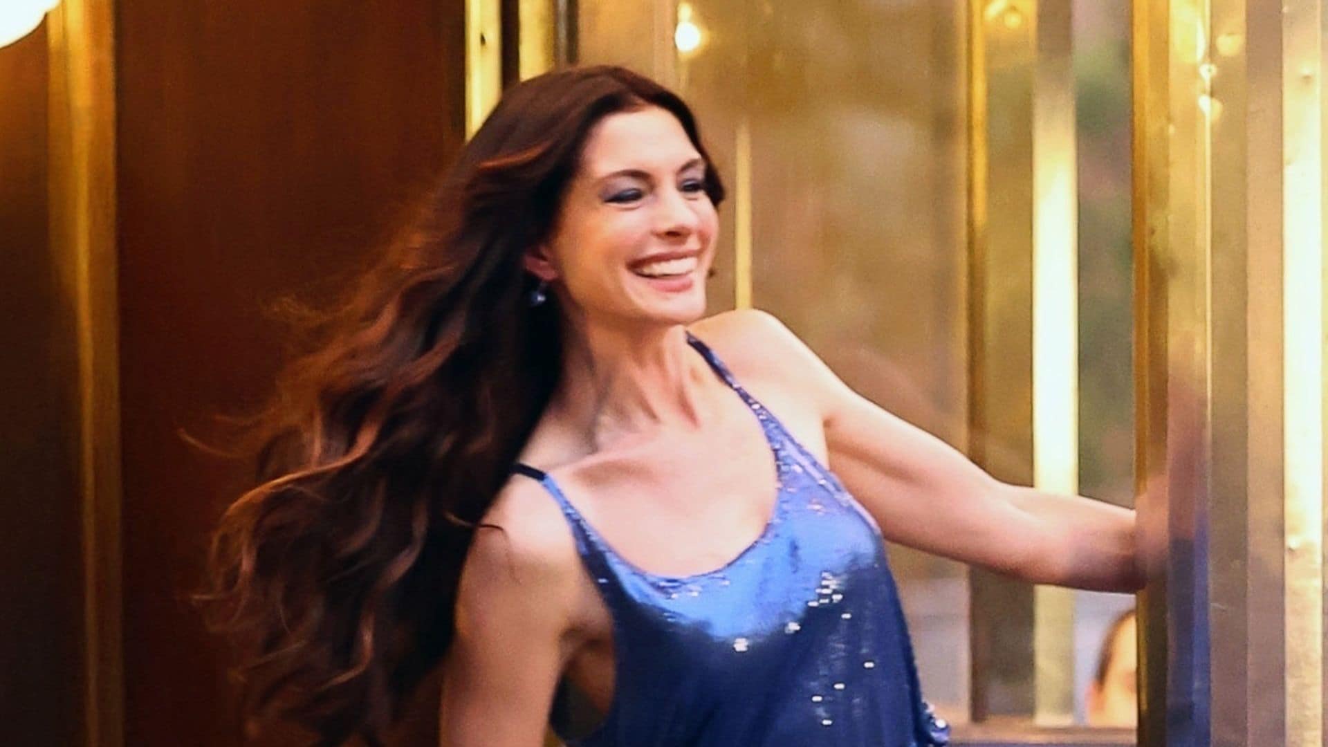 Anne Hathaway shimmers in blue metallic gown while filming 'The Devil Wears Prada 2'