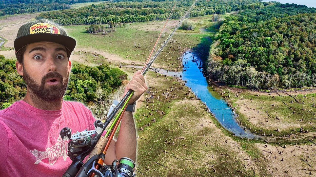 Draining lake almost empty reveals mudhole survivors inside