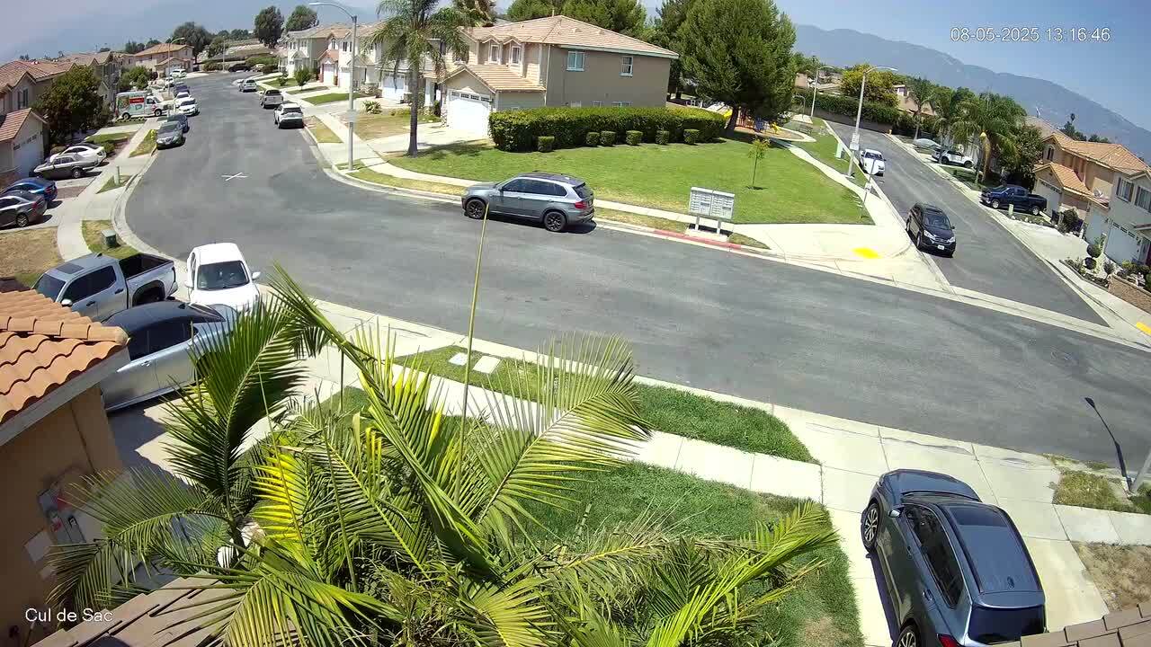 CCTV Footage Shows Speeding Car Collide With Stationary Vehicle