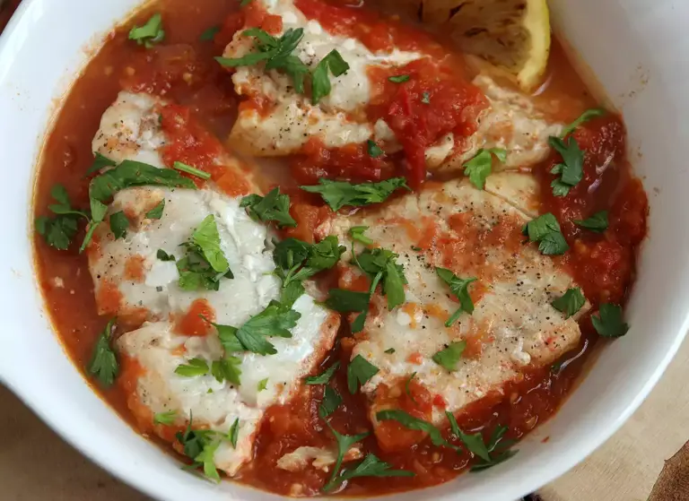 Saithe with a tomato, lemon and cumin sauce - easy and tasty recipe