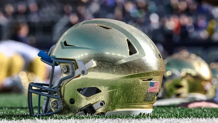 Rick Neuheisel says Notre Dame's 'monster brand' has tainted CFP rankings