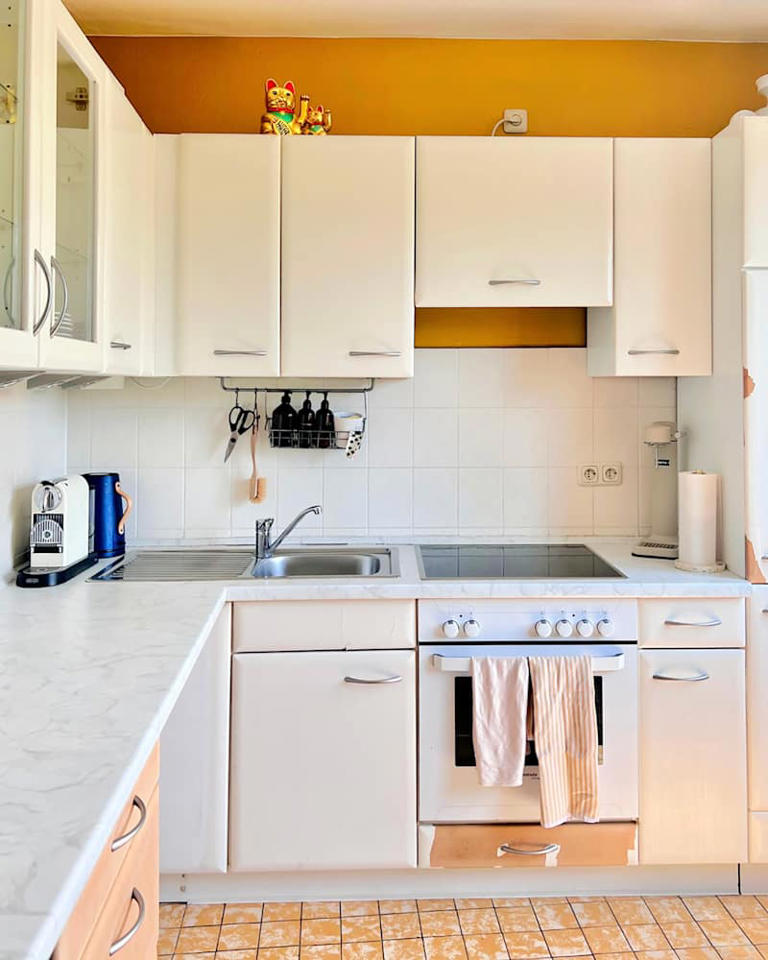 Dull, Peeling Kitchen Cabinets Got a Major Color Boost for $346
