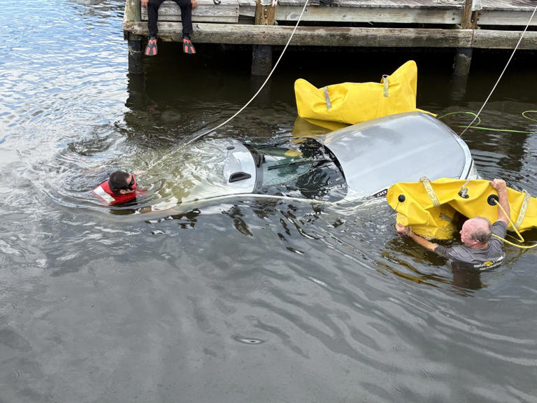 Truck follows flats boat off Venice boat ramp