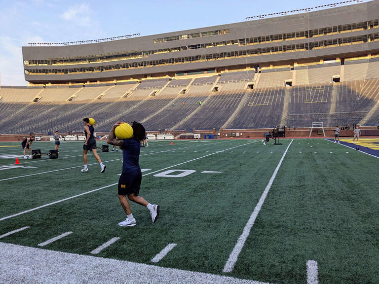 Pushing pickup trucks and throwing TDs: Inside Michigan basketball’s ...