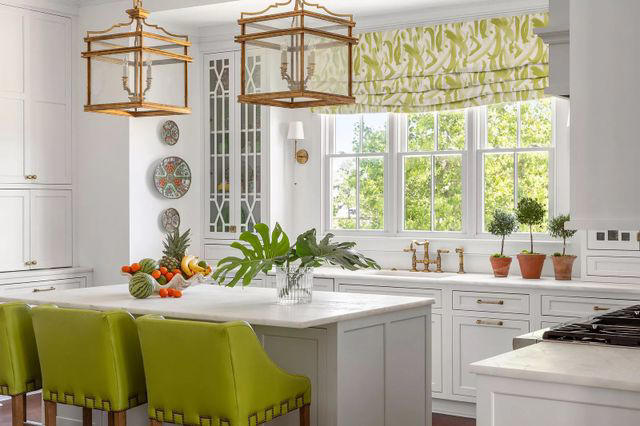 8 Paint Colors Designers Use To Make A Small Kitchen Feel Bigger