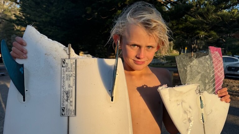 Shark attack at Tathra Beach leaves 9yo surfer's board in pieces