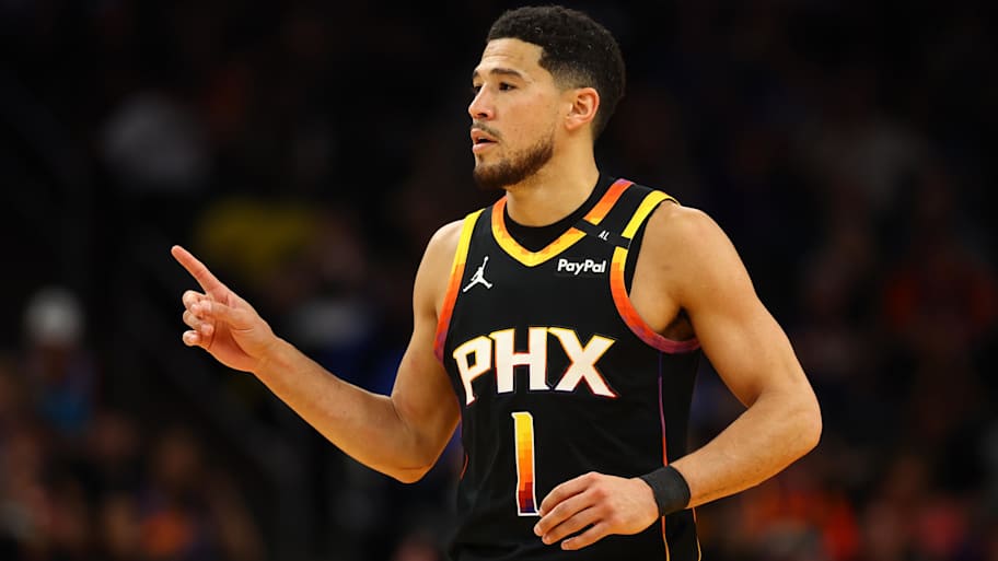Suns superstar Devin Booker perfectly matches his giant dog