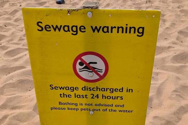 'Disgrace' as hundreds desert Devon beach after pollution alert