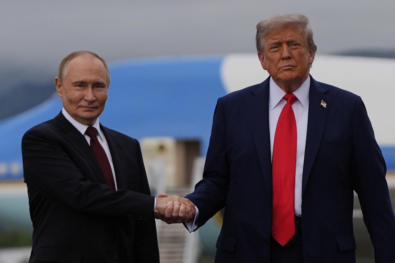 Trump and Putin shake hands in Alaska before kicking off their summit ...