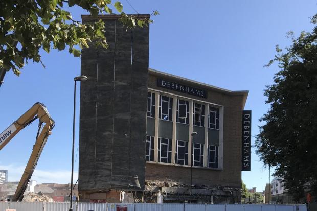 It's almost all gone! Photos show demolition of Debenhams